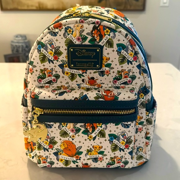 Disney | Accessories | Nwt Disney Loungefly Lion King Tattoo Mini ...